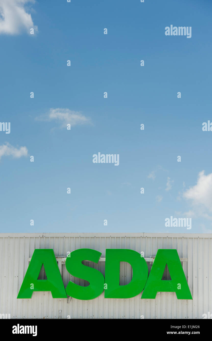 ASDA sign on superstore with blue cloudy sky Stock Photo - Alamy