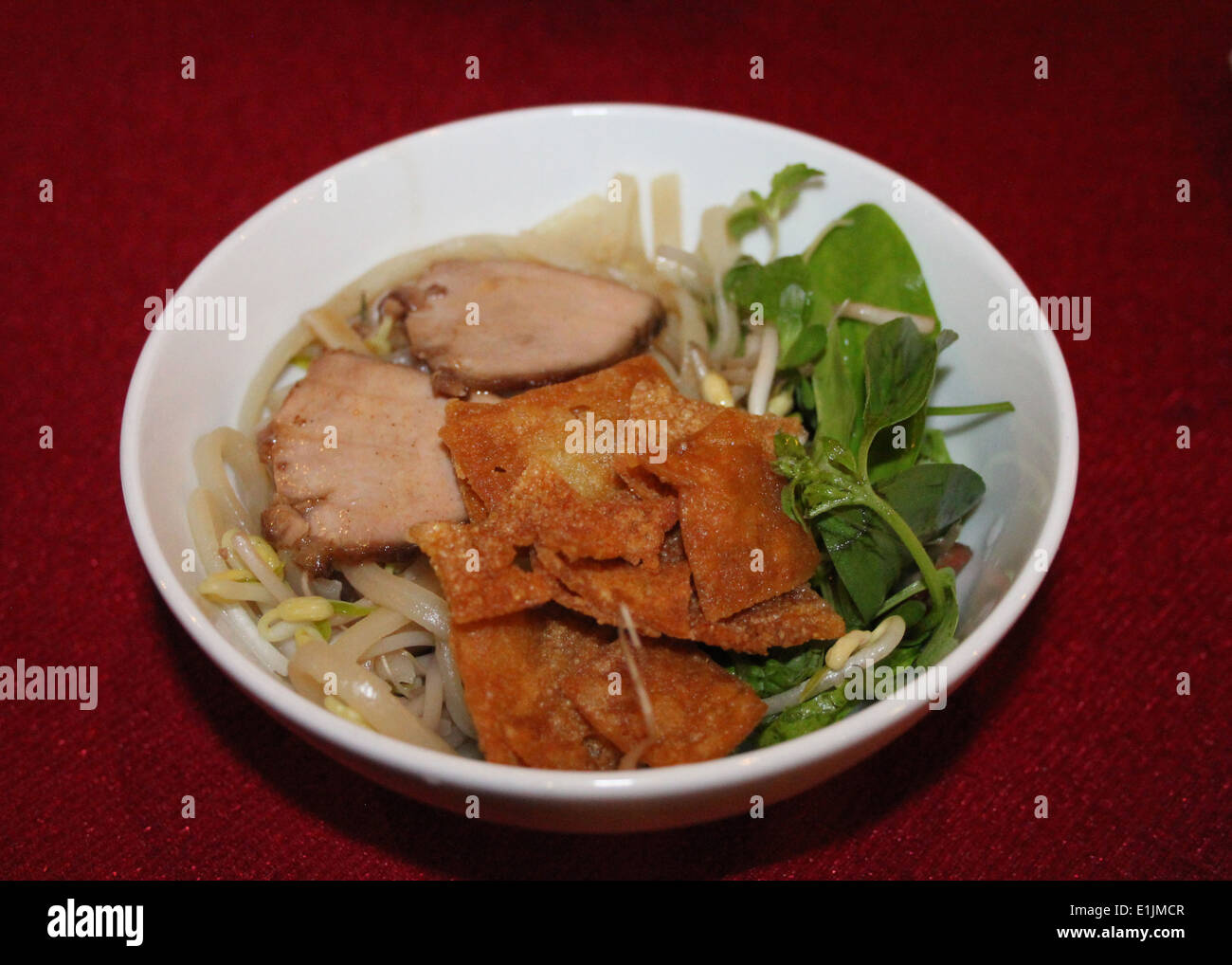 Traditional cao lau with pork and noodles from Hoi An Stock Photo - Alamy