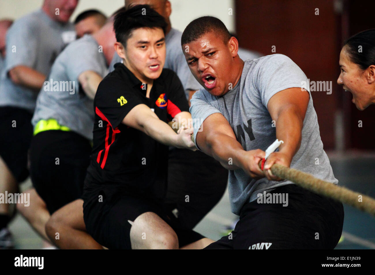 Soldiers from the U.S. Army and Singapore Armed Forces play a game of ...