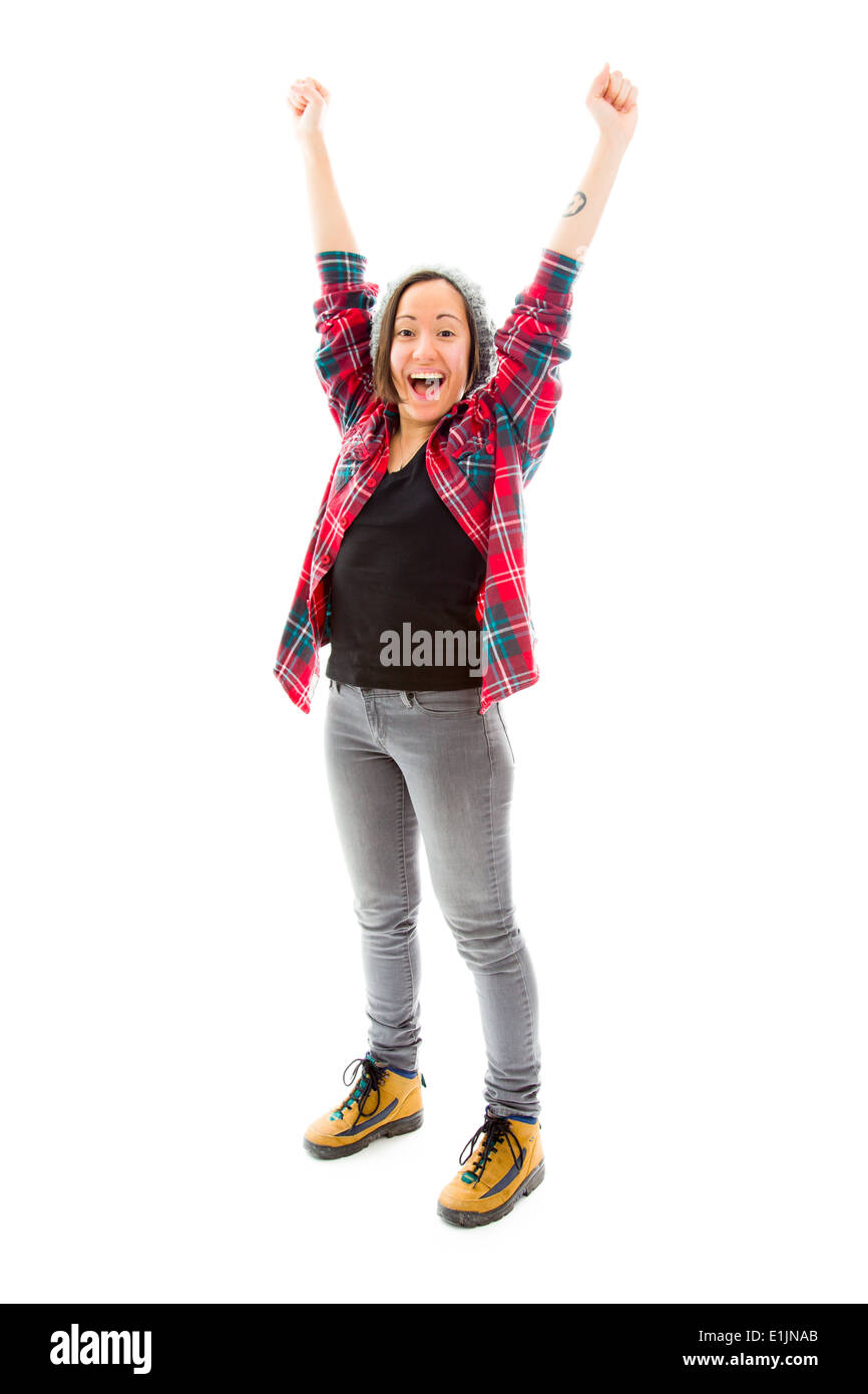 Young woman celebrating with her arms raised Stock Photo - Alamy