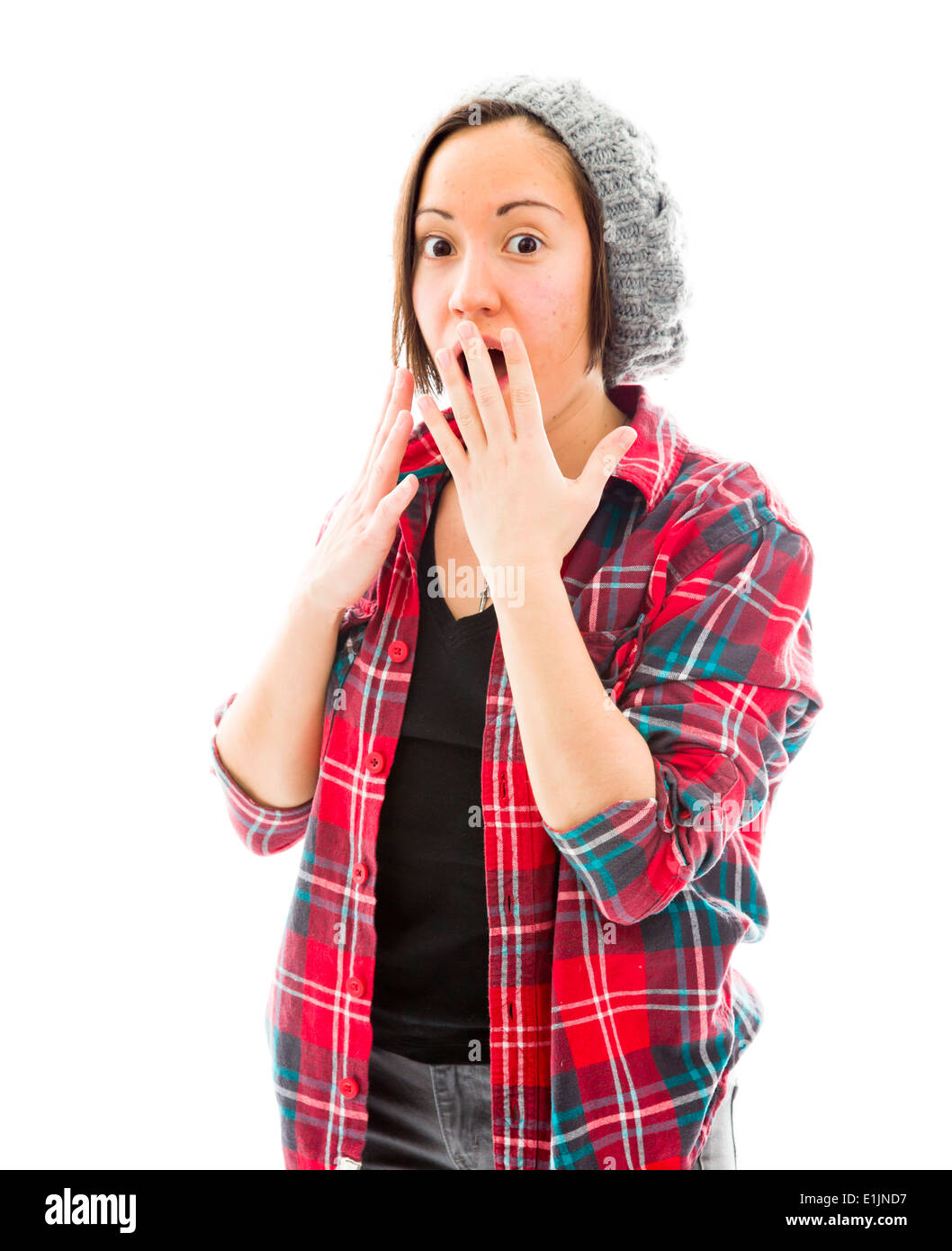 Young woman looking shocked Stock Photo - Alamy