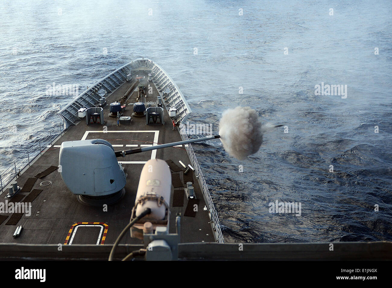 The guided missile cruiser USS Antietam (CG 54) fires its Mark 45 5 ...