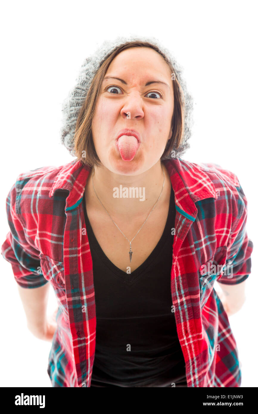 Young woman sticking her tongue out Stock Photo - Alamy