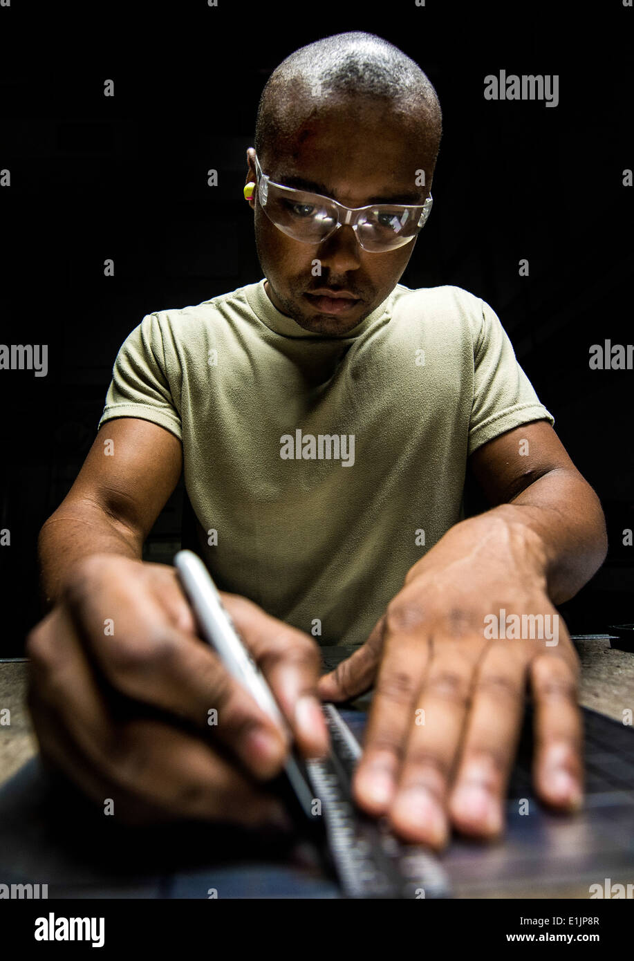 U.S. Air Force Airman 1st Class William Williams, an aircraft metals ...
