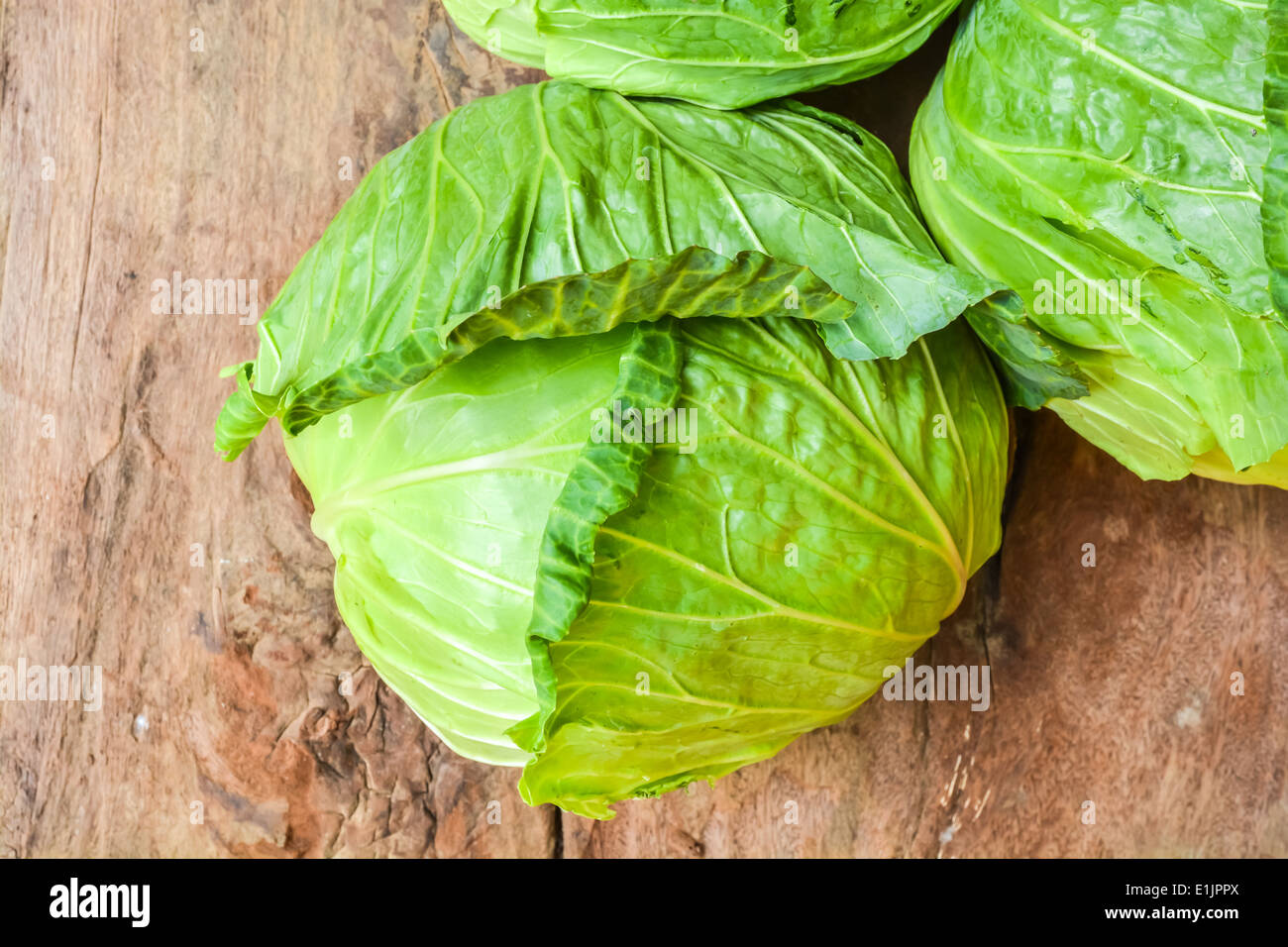 Cabbage vegetable place on old wooden Stock Photo - Alamy