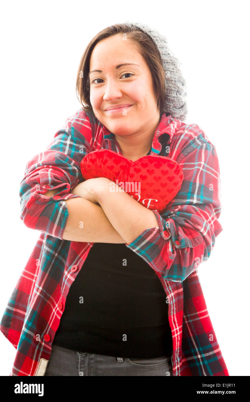 Young woman embracing heart shape Stock Photo - Alamy