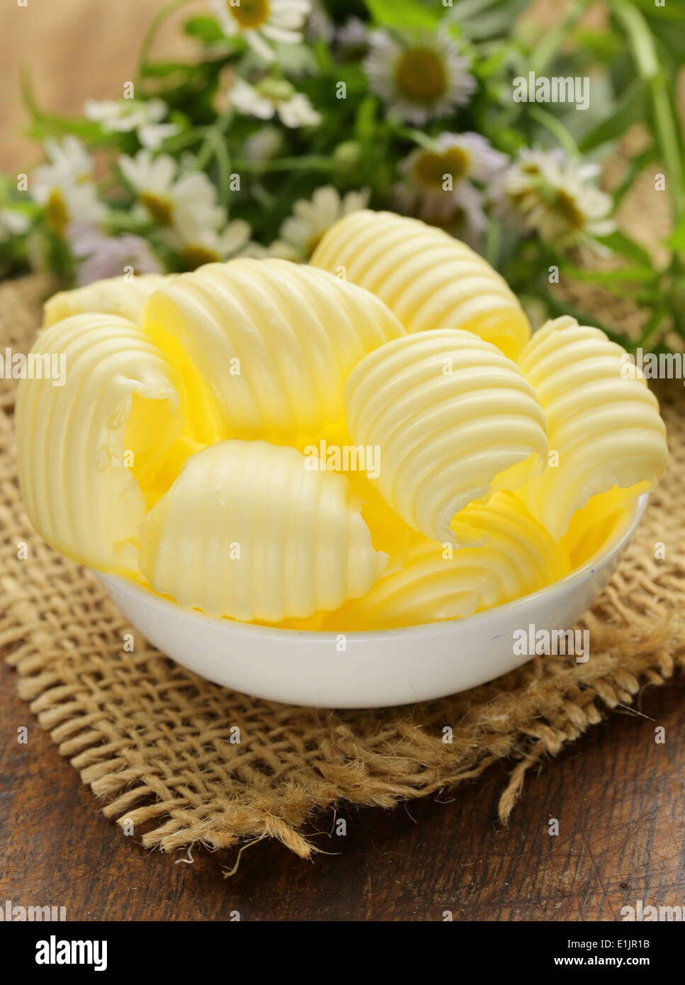 fresh yellow dairy butter in a white bowl Stock Photo - Alamy