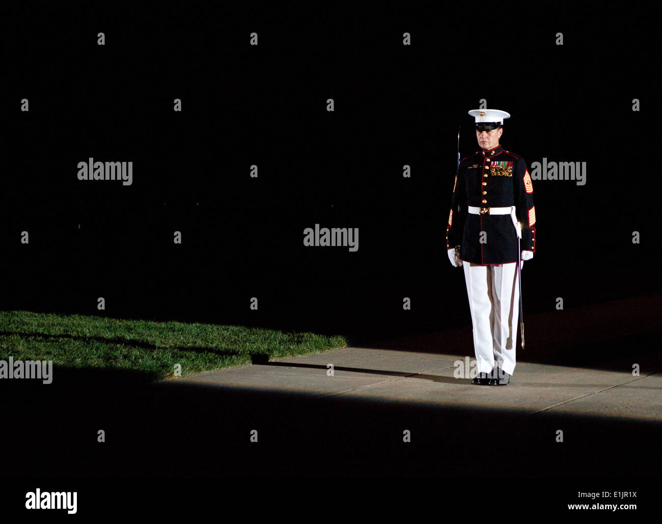 U.S. Marine Sgt. Maj. Angela M. Maness stands at center walk during the ...