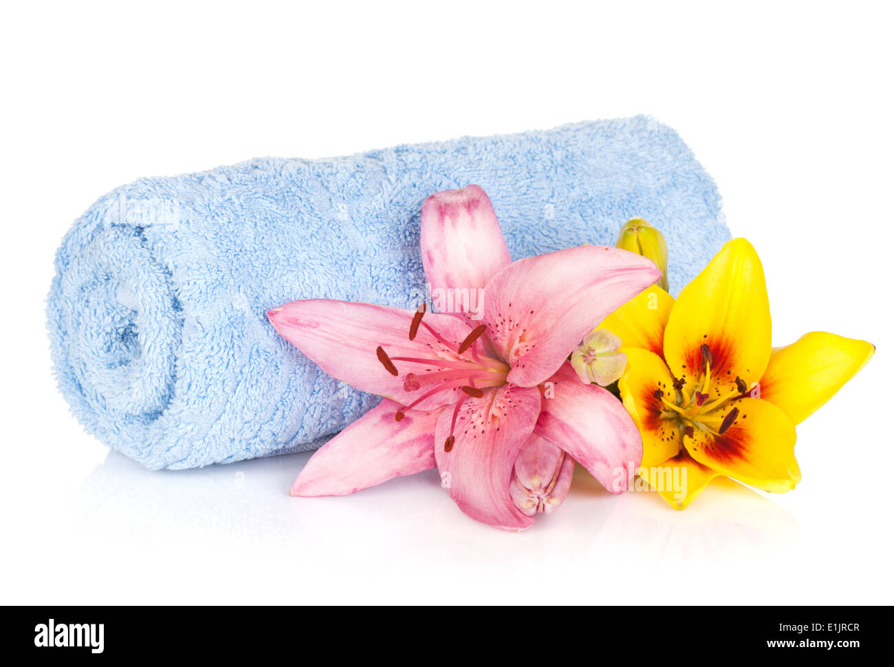 Spa setting with colorful lily flowers. Isolated on white background ...