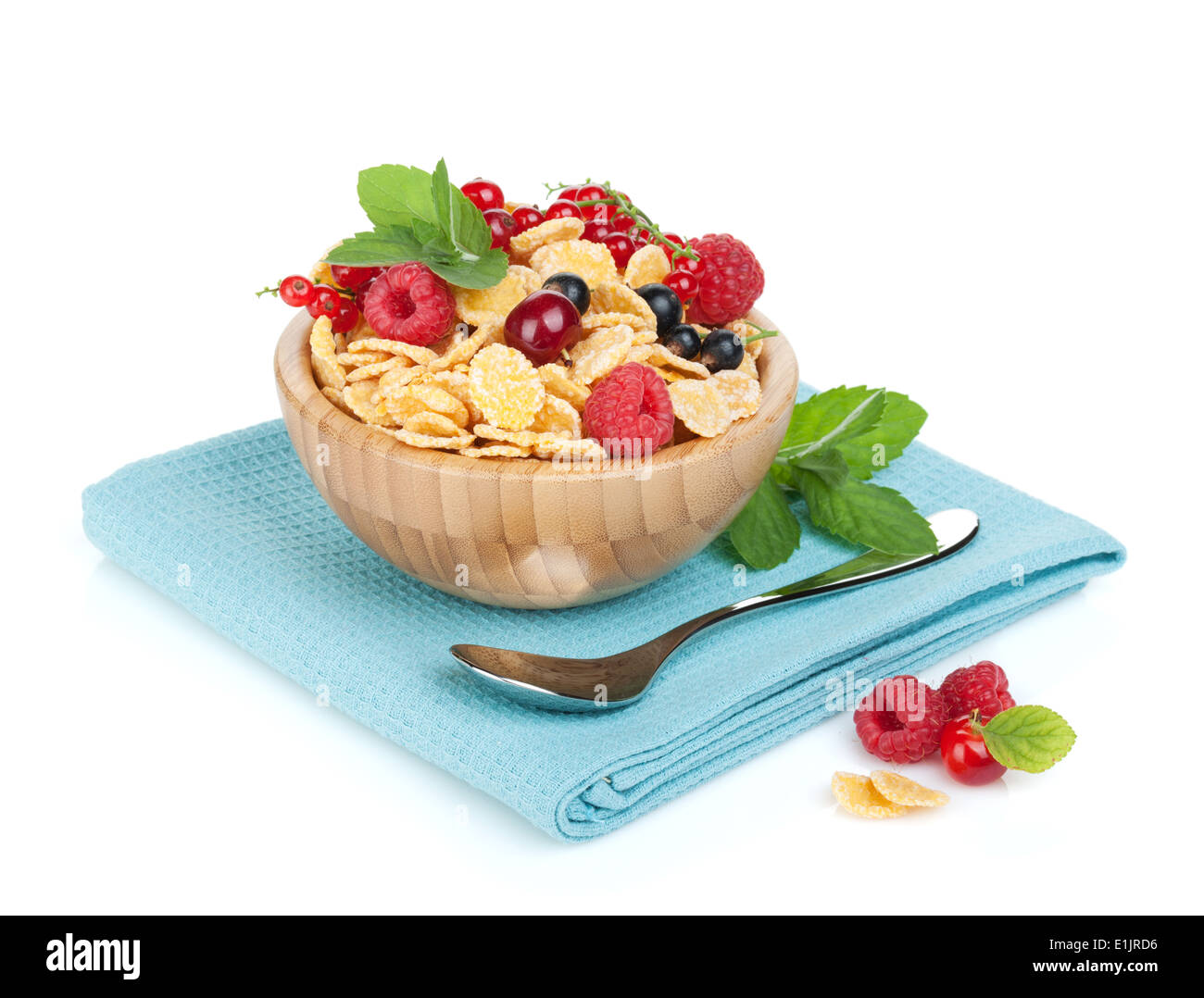 Fresh corn flakes with berries in bowl. Isolated on white background ...