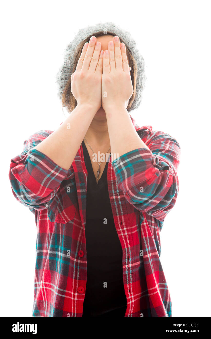 Young woman hiding face with hands Stock Photo - Alamy