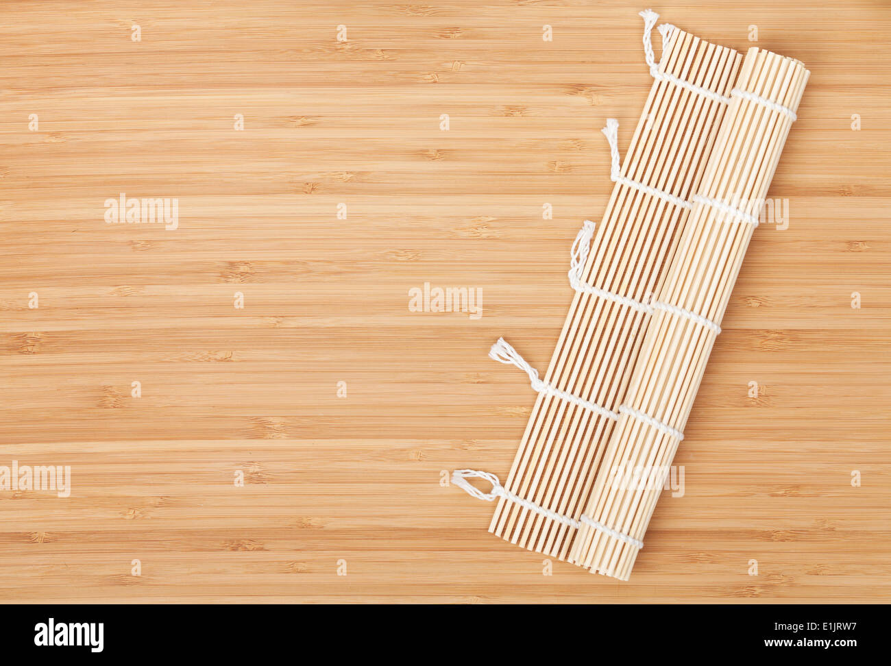 Sushi mat over bamboo table. View from above with copy space Stock ...