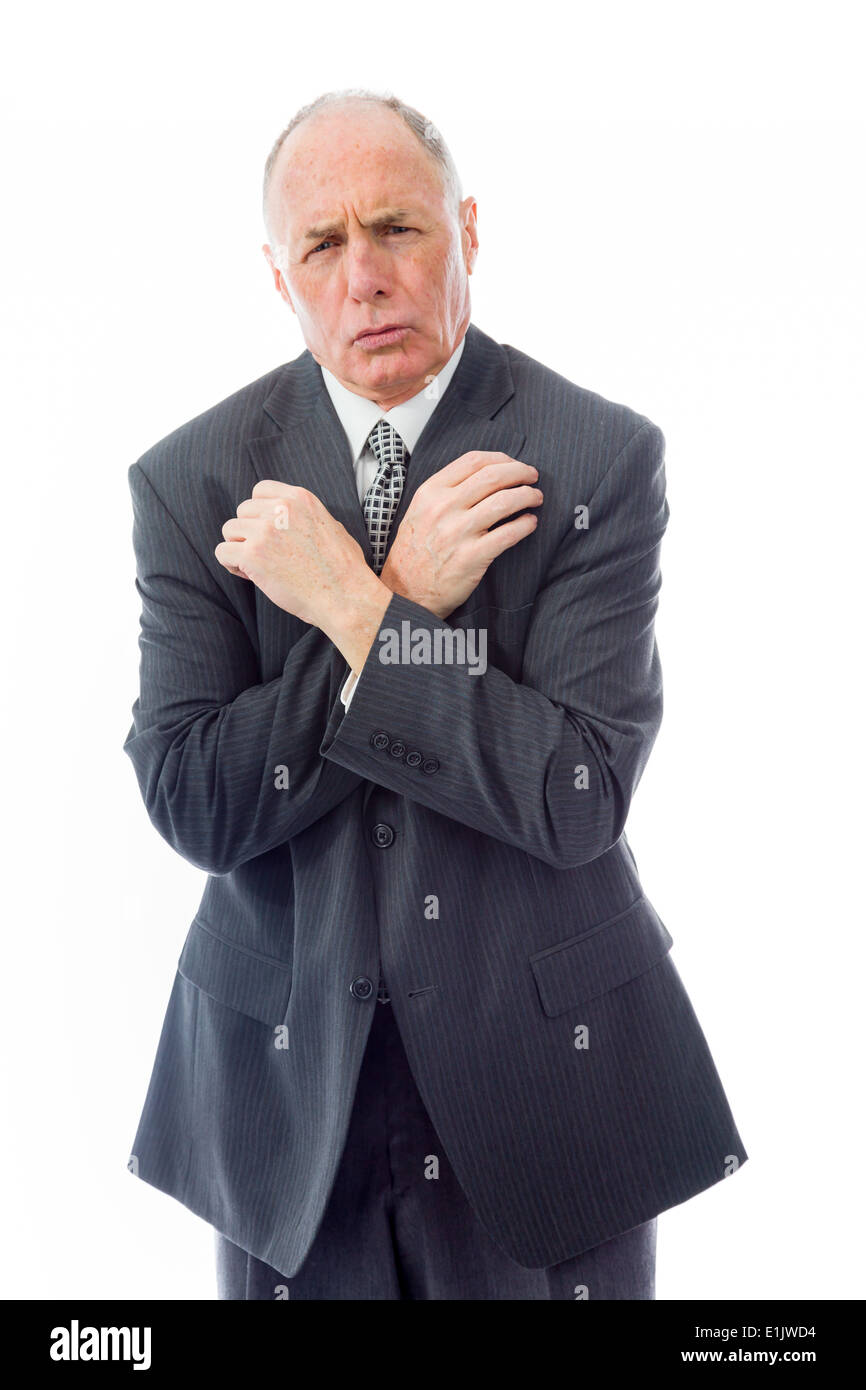 Businessman shivering in the cold isolated on white background Stock ...