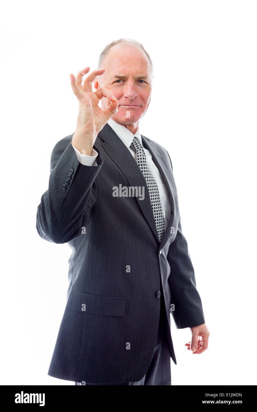 Businessman showing sign hi-res stock photography and images - Alamy