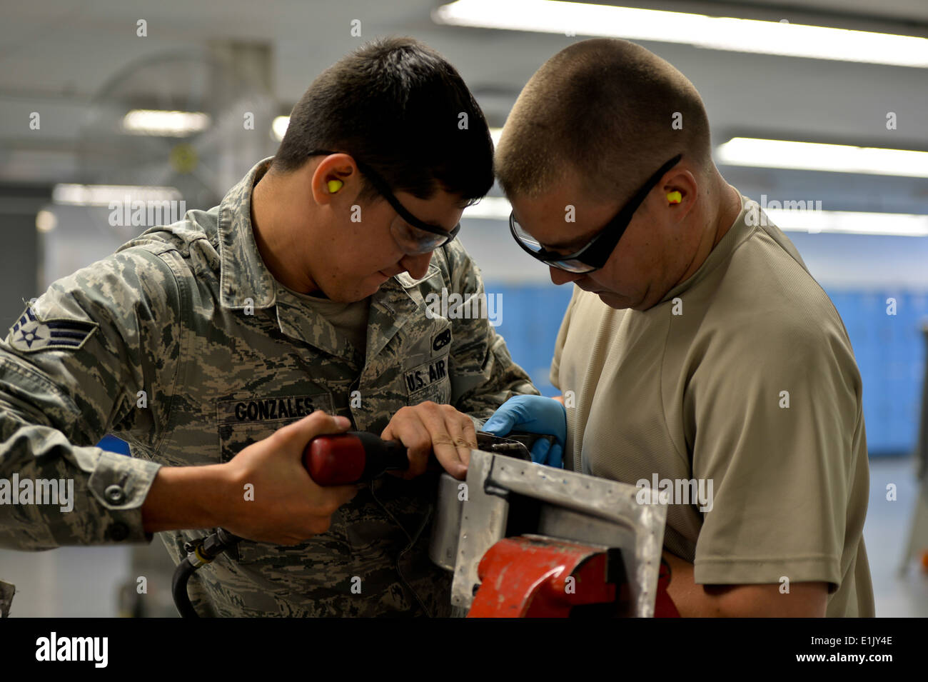 U.S. Air Force Senior Airman Sergio Gonzalez, left, and Airman 1st ...