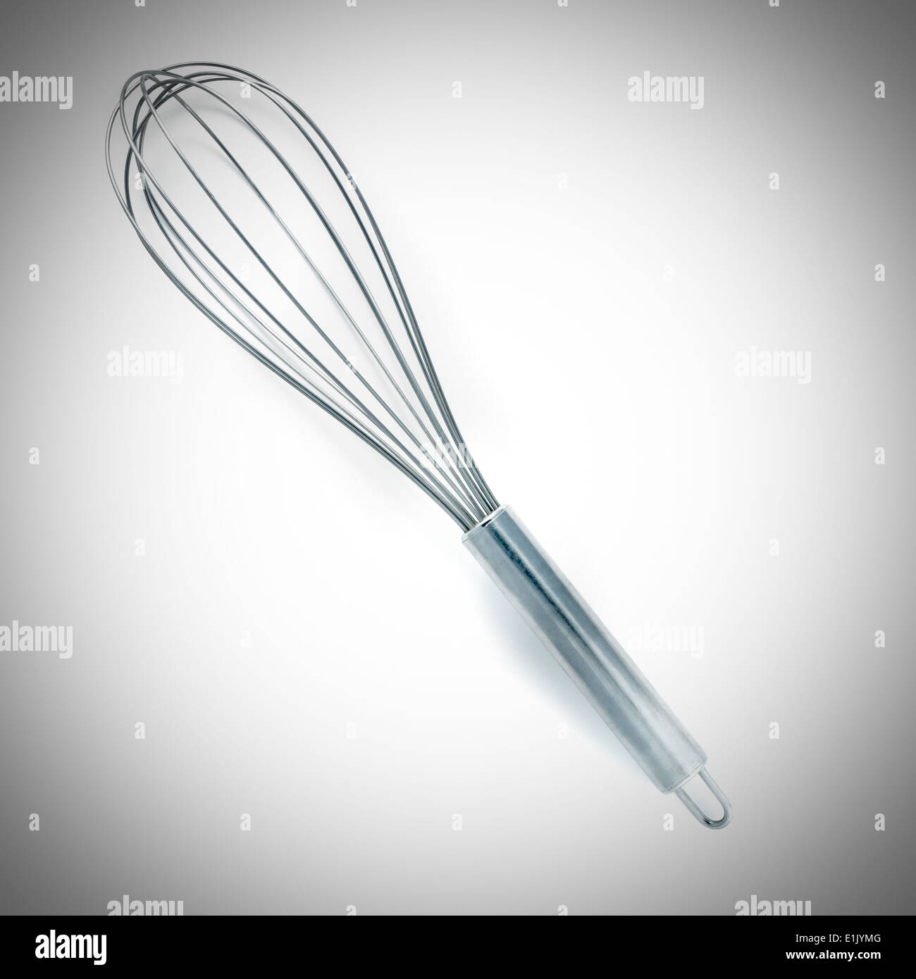 stainless wisk isolated on a white background Stock Photo - Alamy
