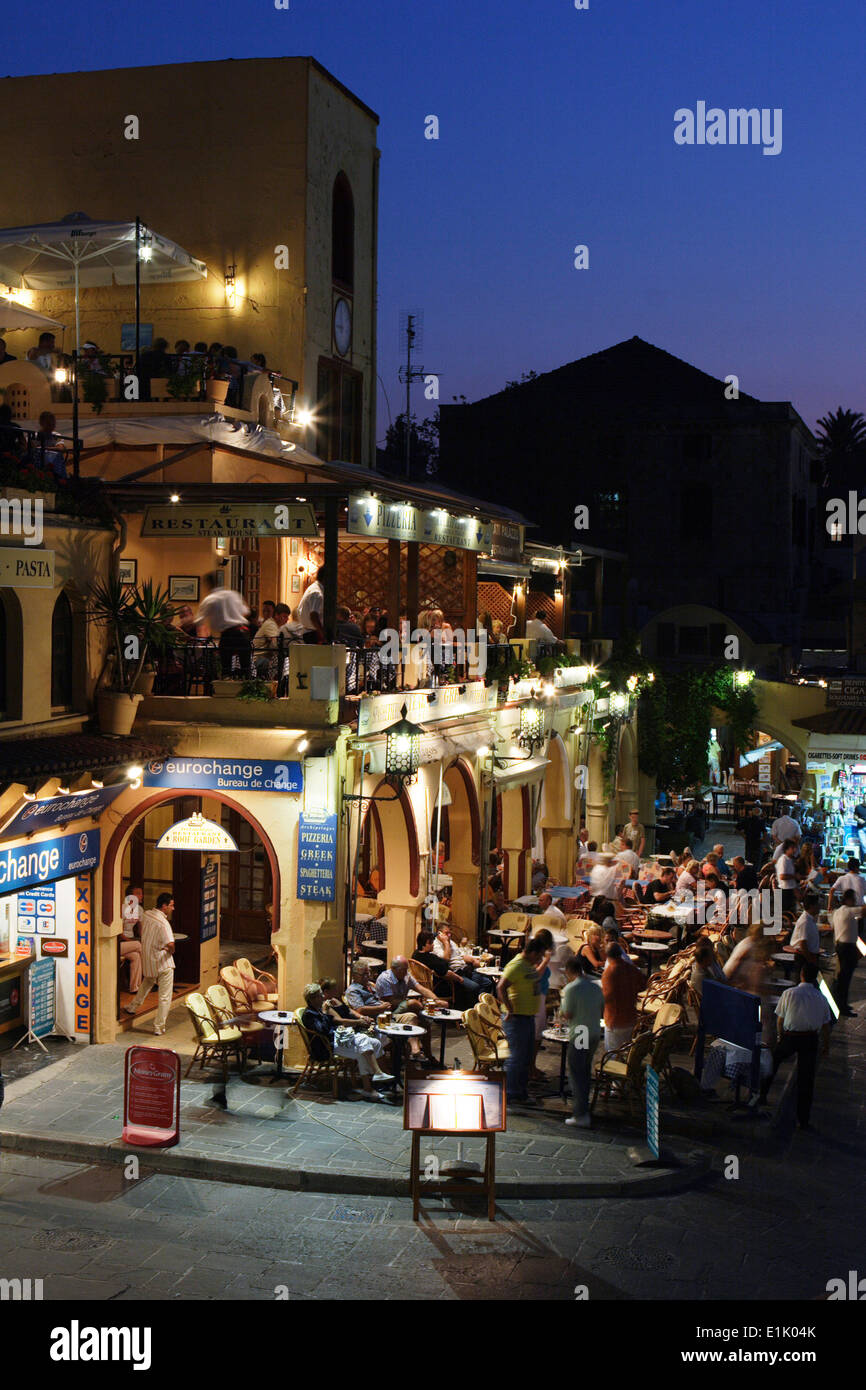 People dining outside on the streets of Rhodes, Rhodes Island, Greece ...