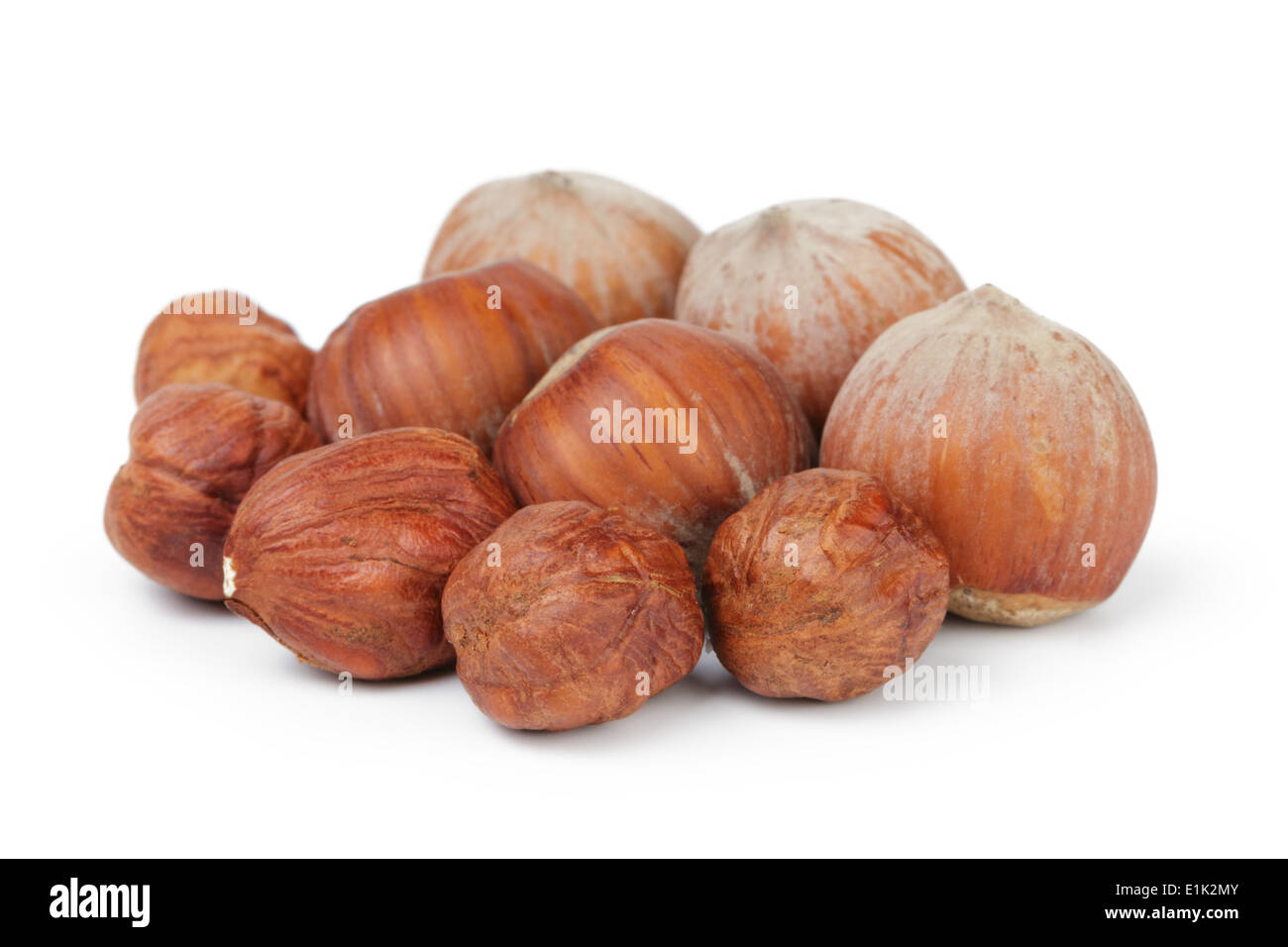 Heap of hazelnuts nuts background Cut Out Stock Images & Pictures - Alamy