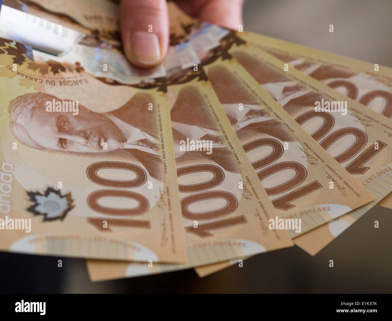 Show Me the Money: 5 Canadian Hundred dollar bills. Five Canadian Stock ...