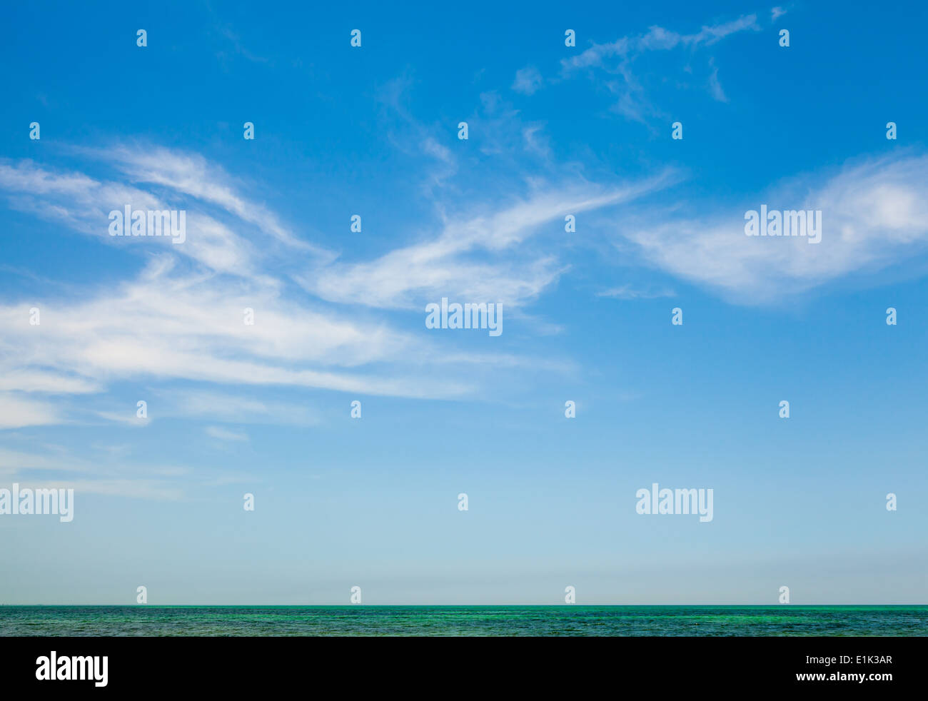 Beautiful cloudy sky over the sea. Nature background Stock Photo - Alamy