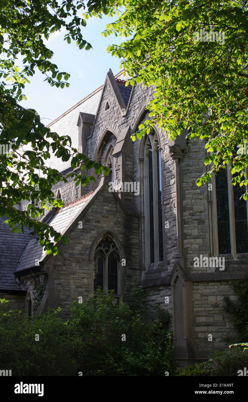 Church through trees Stock Photo - Alamy