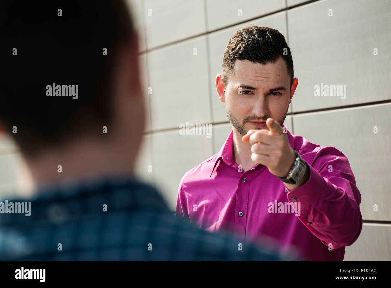Portrait of man talking to teenager Stock Photo - Alamy