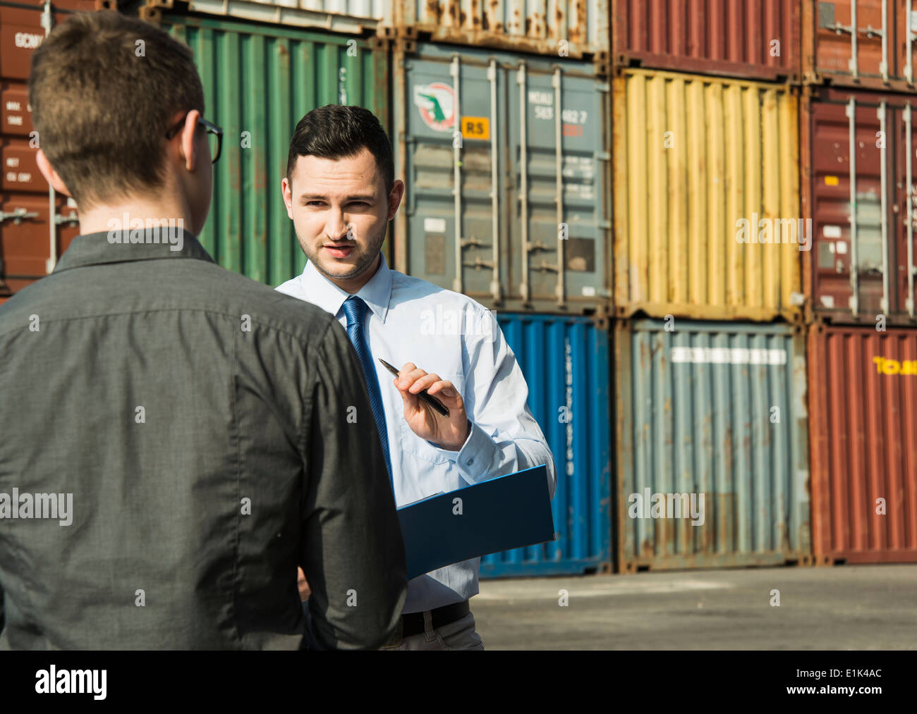 Businessman talking teenager container terminal hi-res stock ...