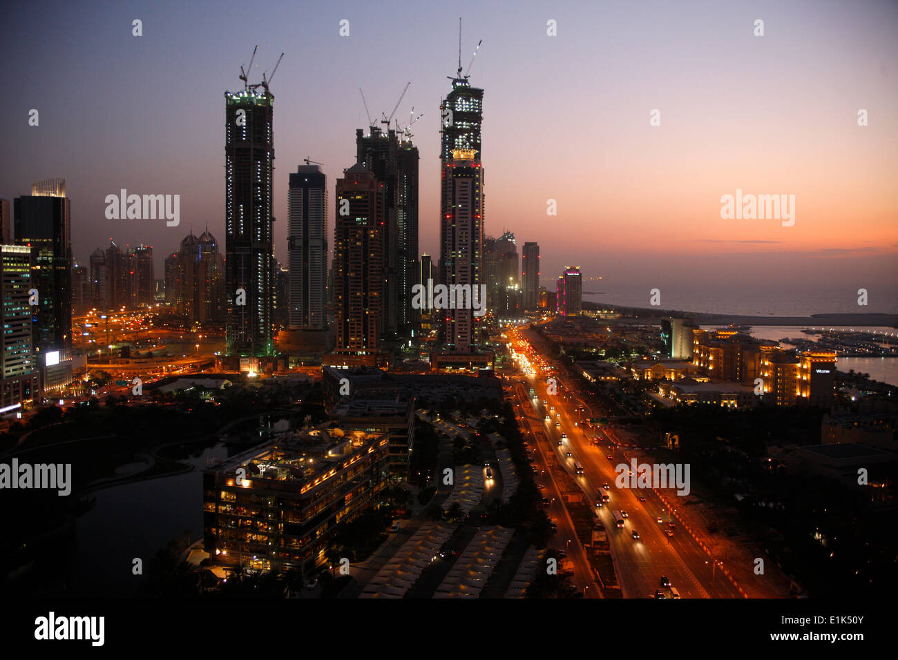 Dubai skyline in sunset hi-res stock photography and images - Alamy