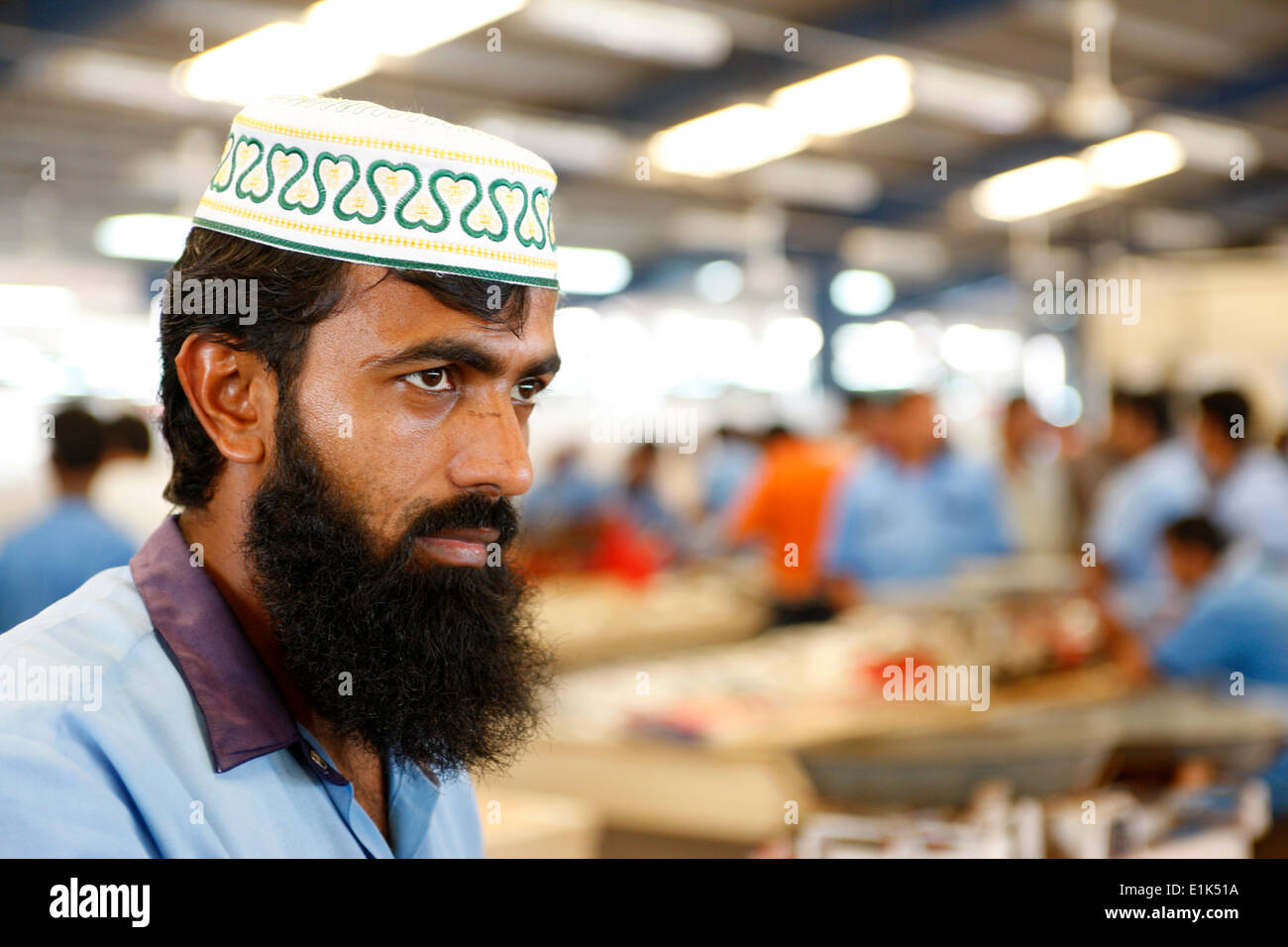 Muslim worker in Dubai Stock Photo - Alamy