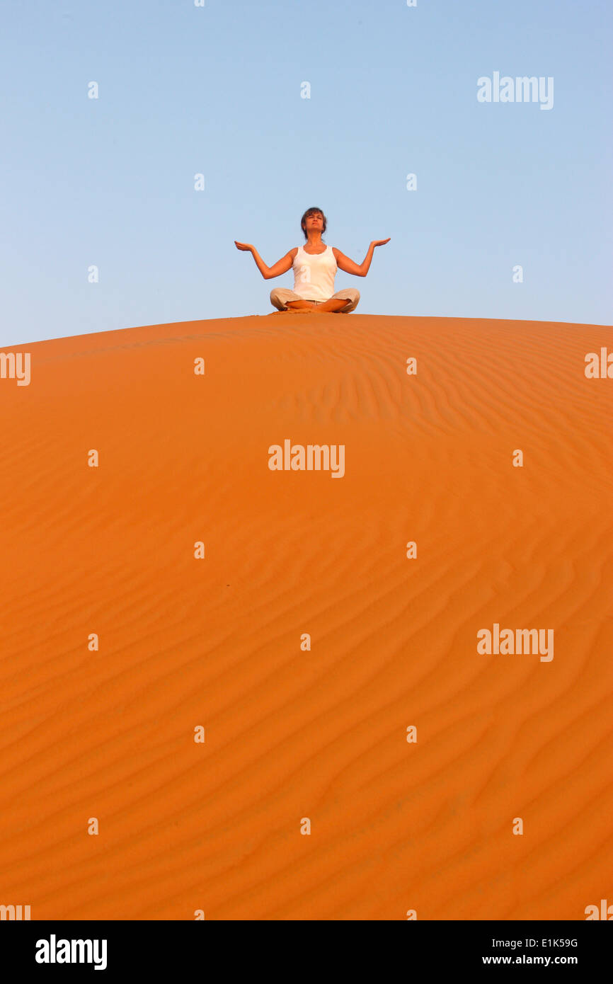 Meditation in the desert Stock Photo - Alamy
