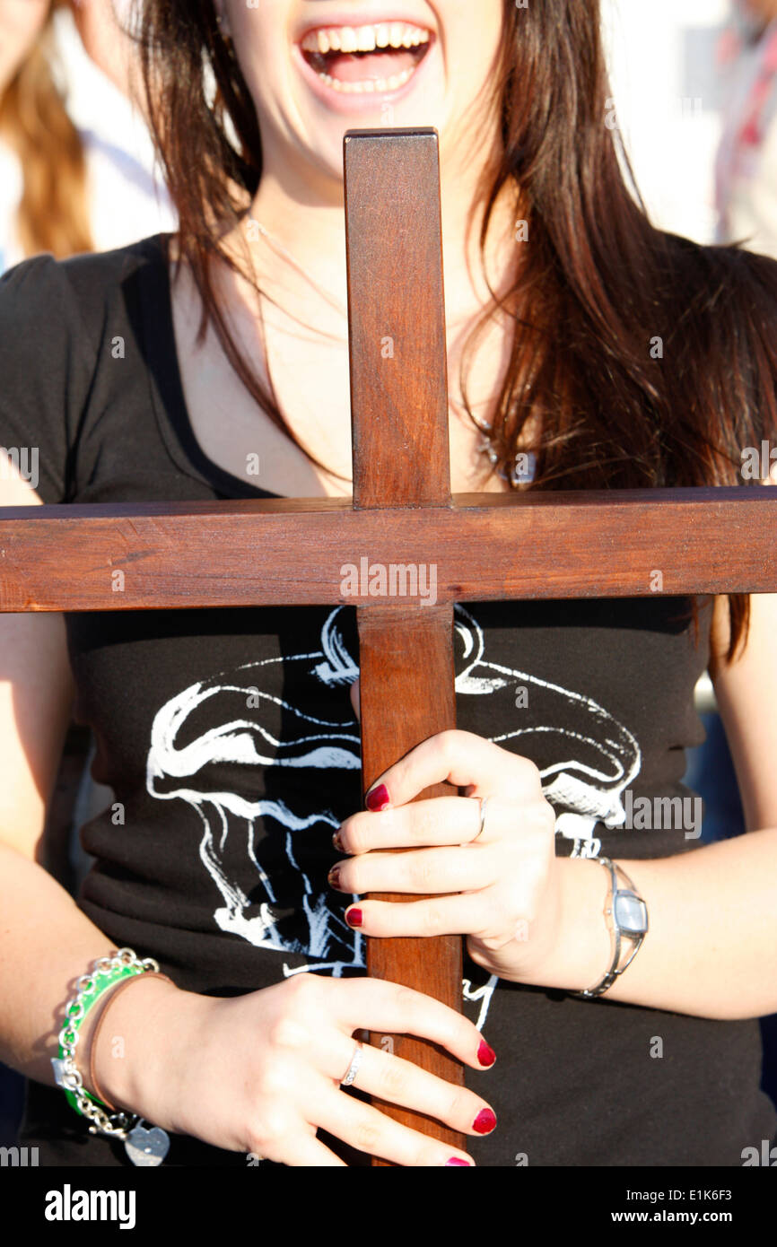 Young catholic girl with a cross Stock Photo - Alamy