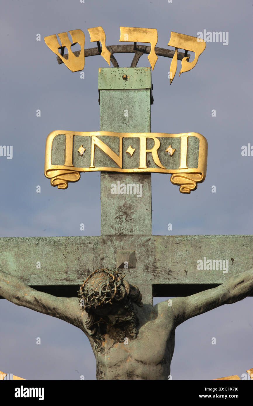 Statue of Jesus on the cross with Hebrew lettering on Charles bridge ...