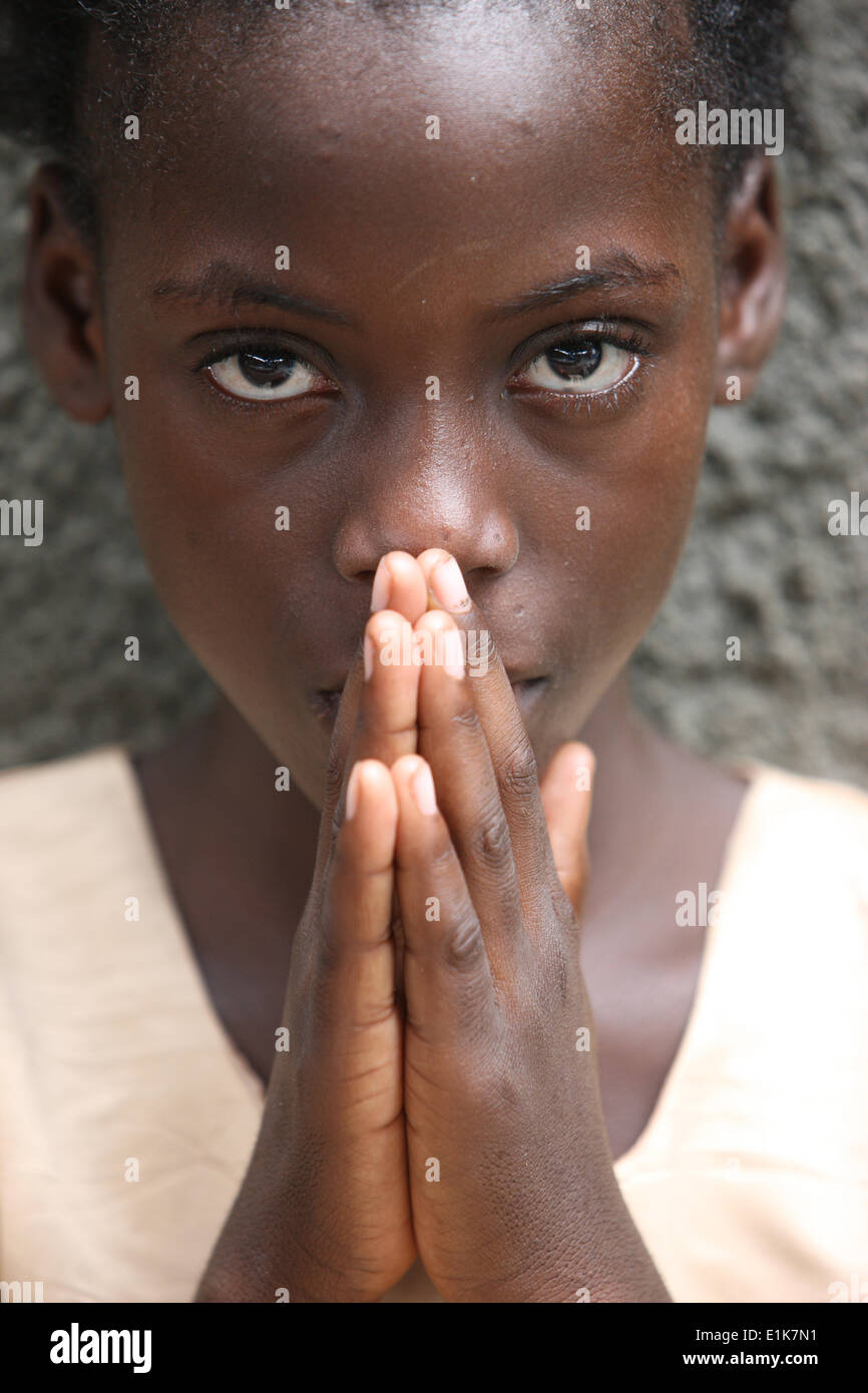 Child praying church hi-res stock photography and images - Alamy