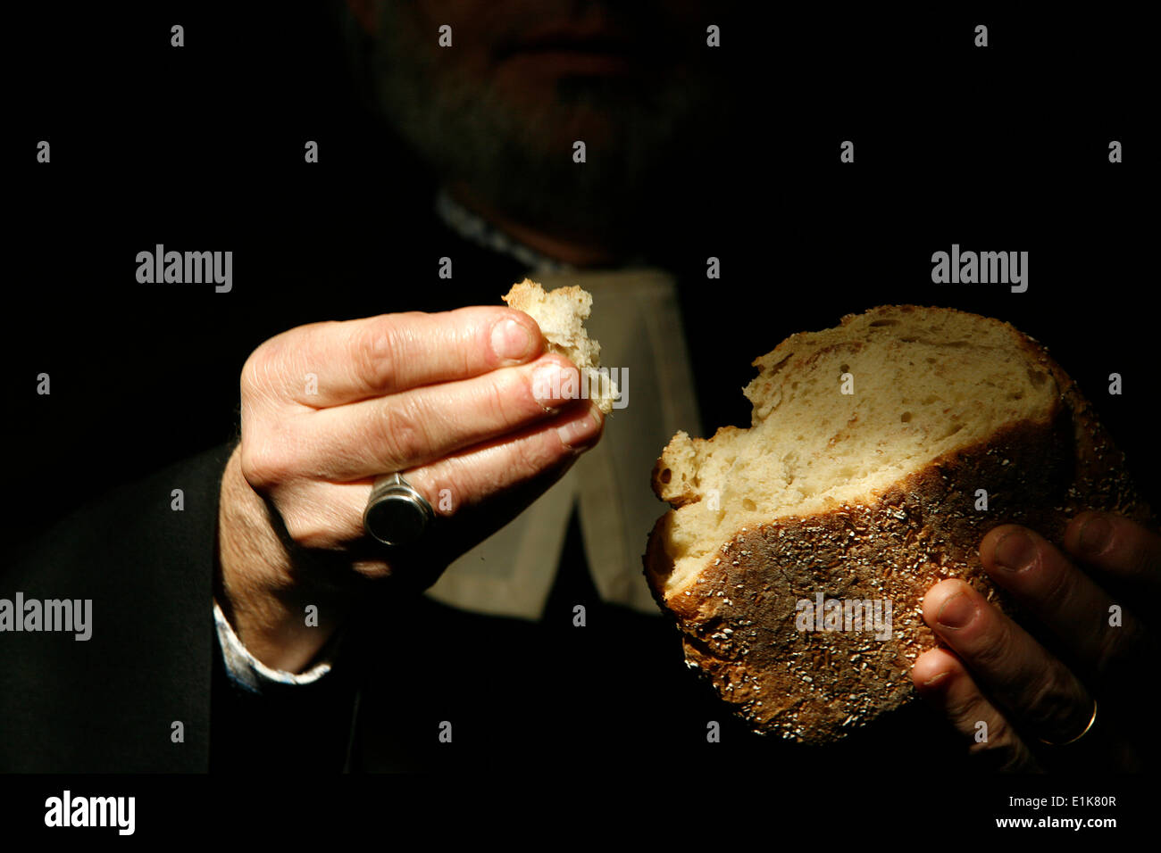 Minister of the eucharist hi-res stock photography and images - Alamy