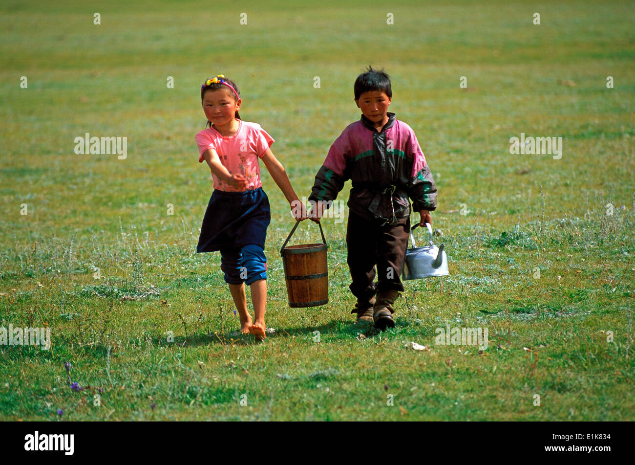 Boy fetching water hi-res stock photography and images - Alamy