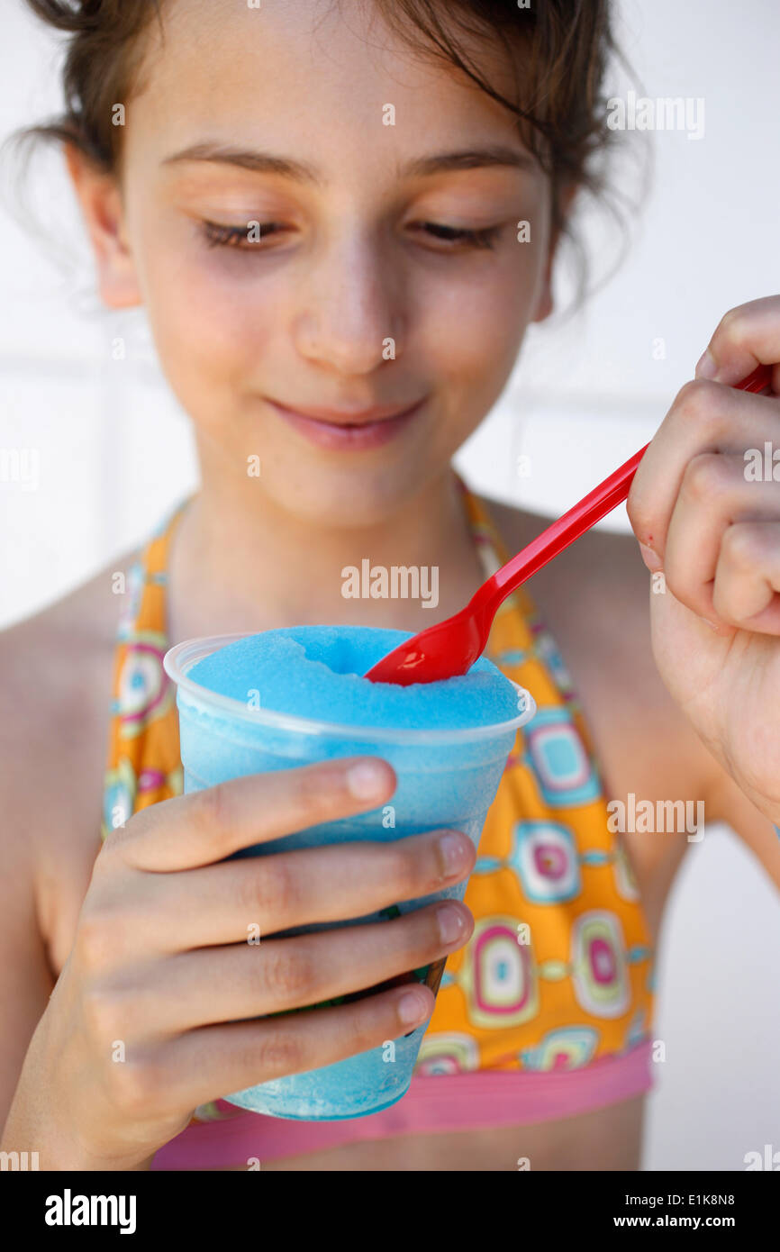 Girl eating slush Stock Photo - Alamy