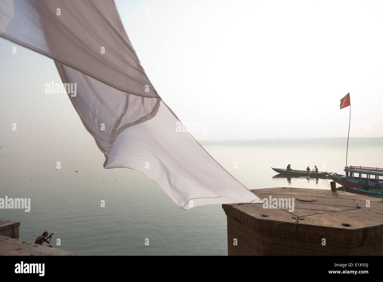 White sari drying up along Ganga river in Varanasi Stock Photo - Alamy