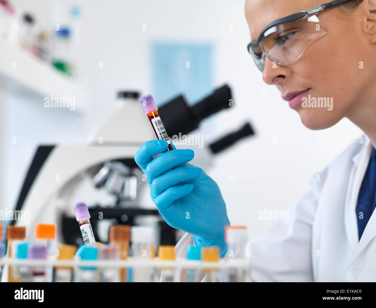Scientist woman blood test hi-res stock photography and images - Alamy
