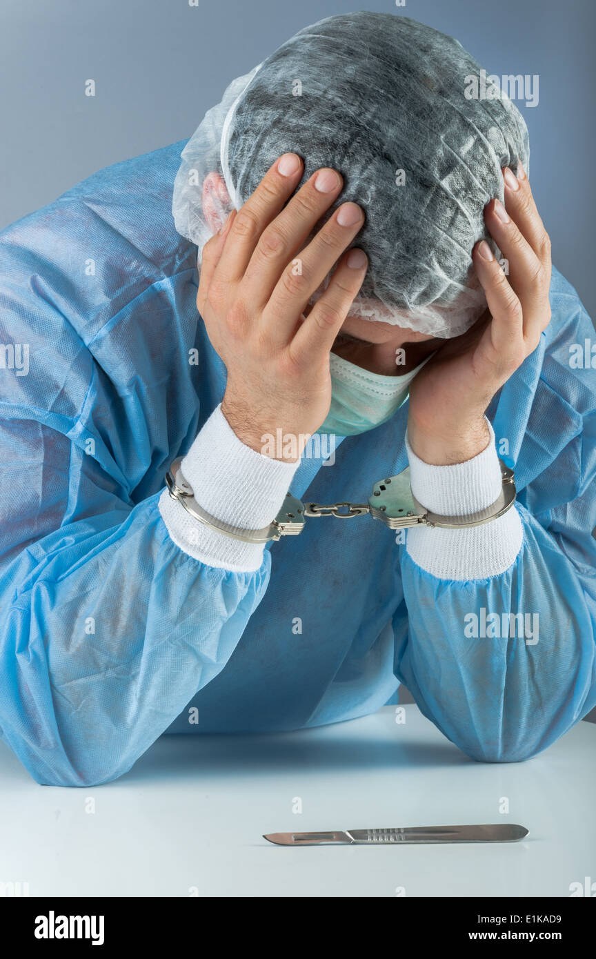 failure guilty doctor regretful criminal handcuffed surgeon portrait ...