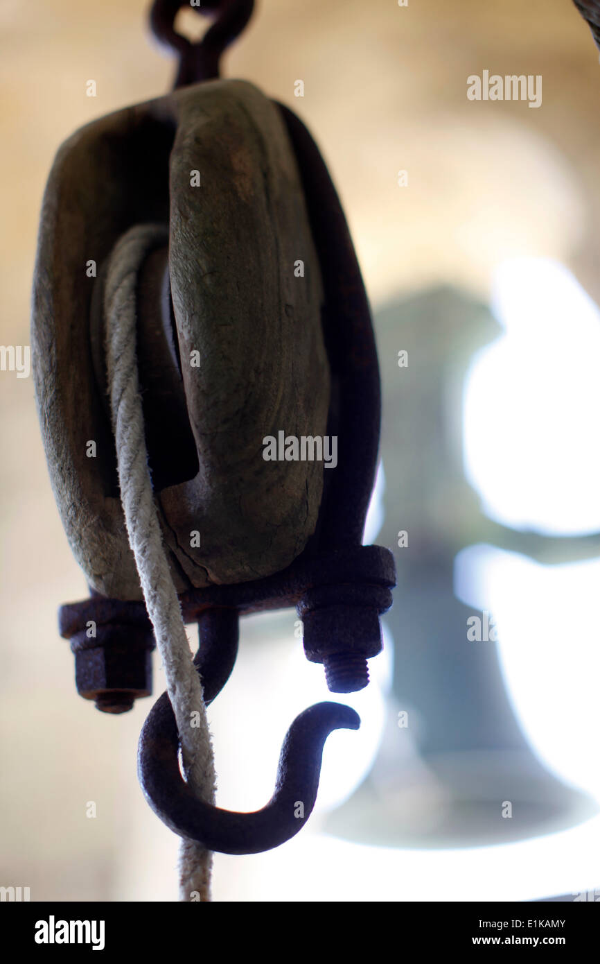 Iglesia de Santa Maria de Coronada bell pulley Stock Photo - Alamy