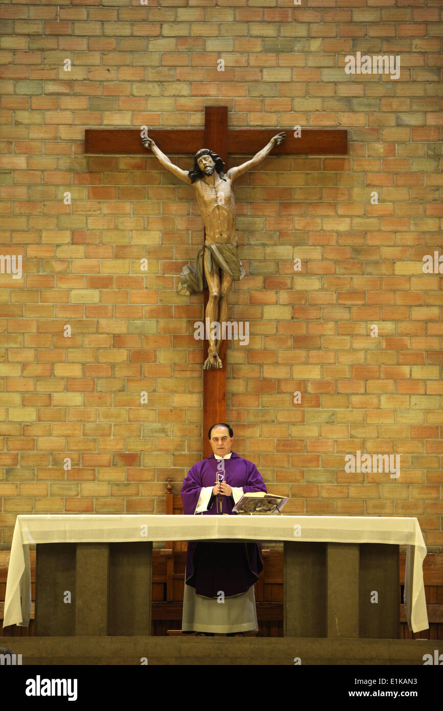Priest saying mass in Stella Maris church Stock Photo - Alamy