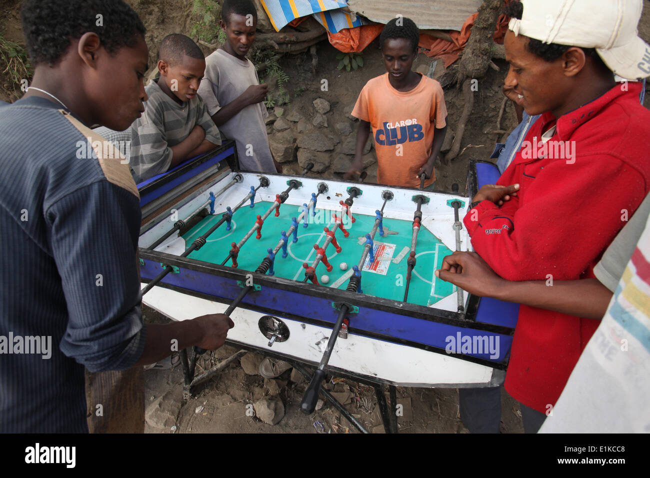 Boys playing table football Stock Photo - Alamy