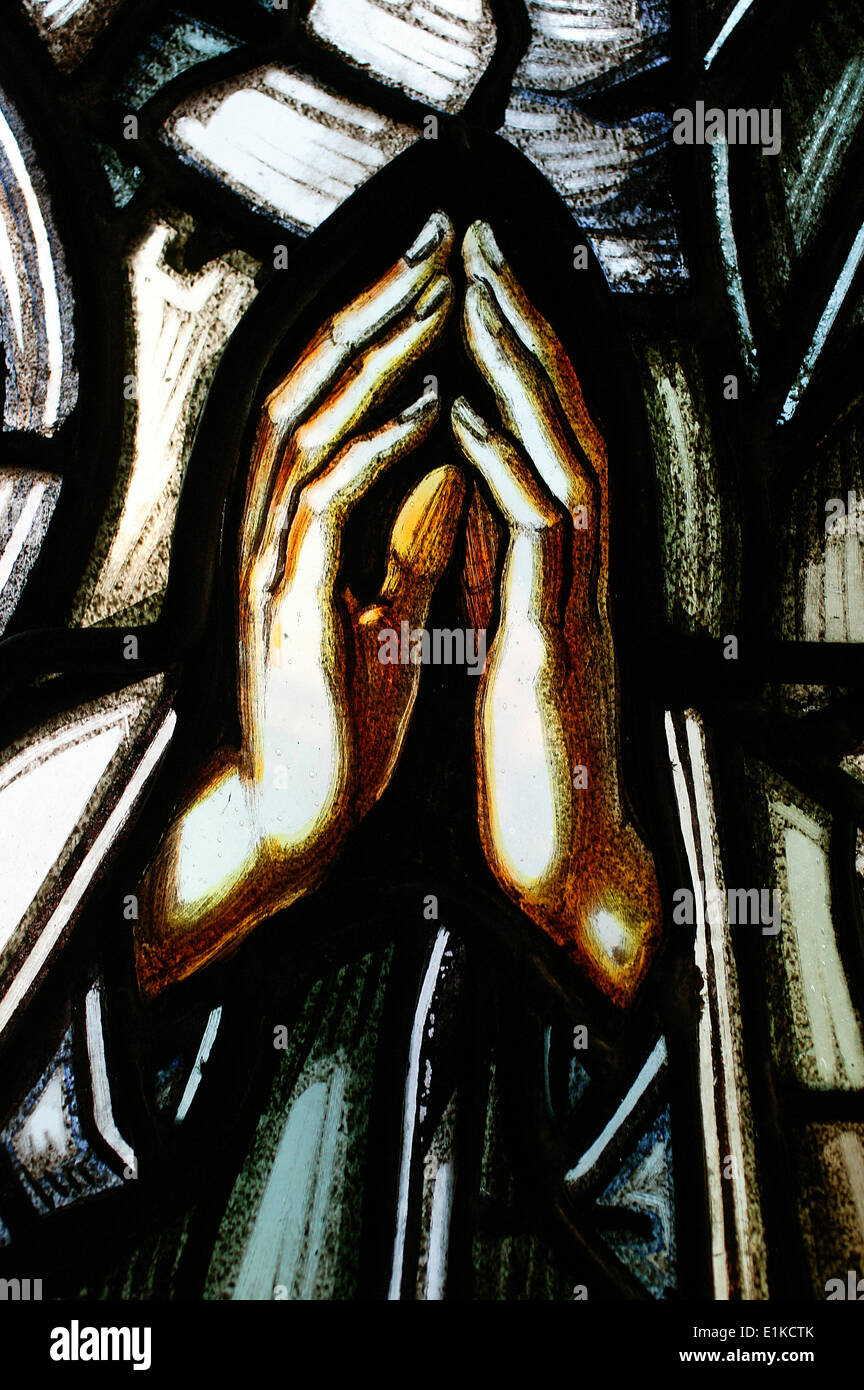 Praying stained glass window window hi-res stock photography and images ...