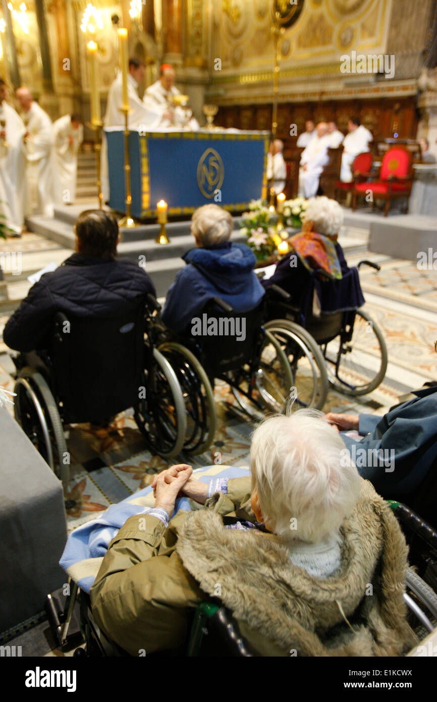 Sick persons' mass in Fourvi re basilica Stock Photo - Alamy