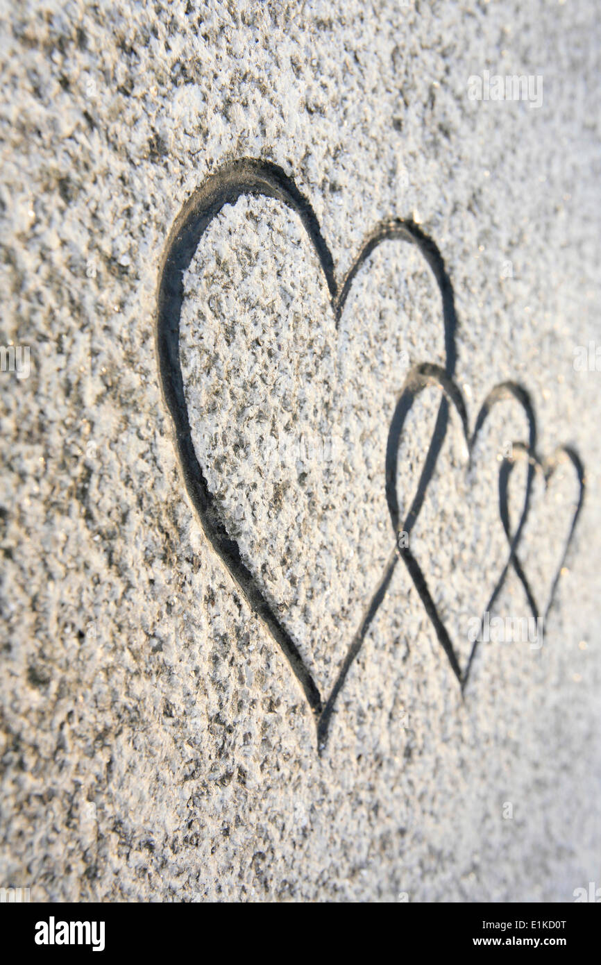 Intertwined hearts hi-res stock photography and images - Alamy
