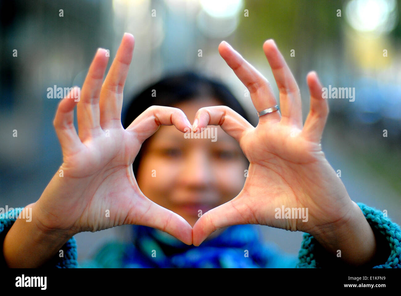 Hand woman making sign hi-res stock photography and images - Alamy