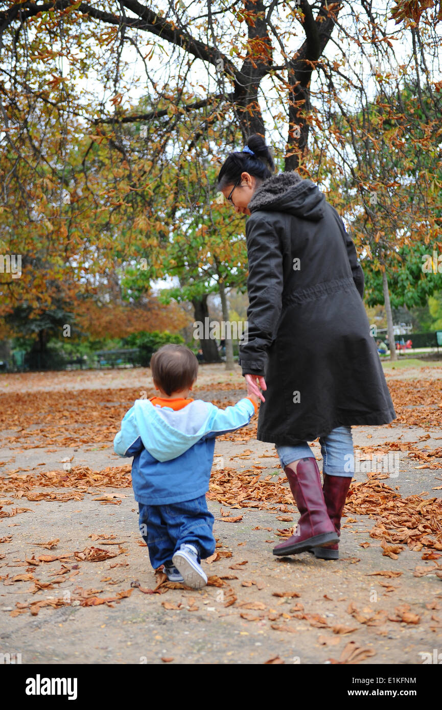 Toddler learning to walk Stock Photo - Alamy