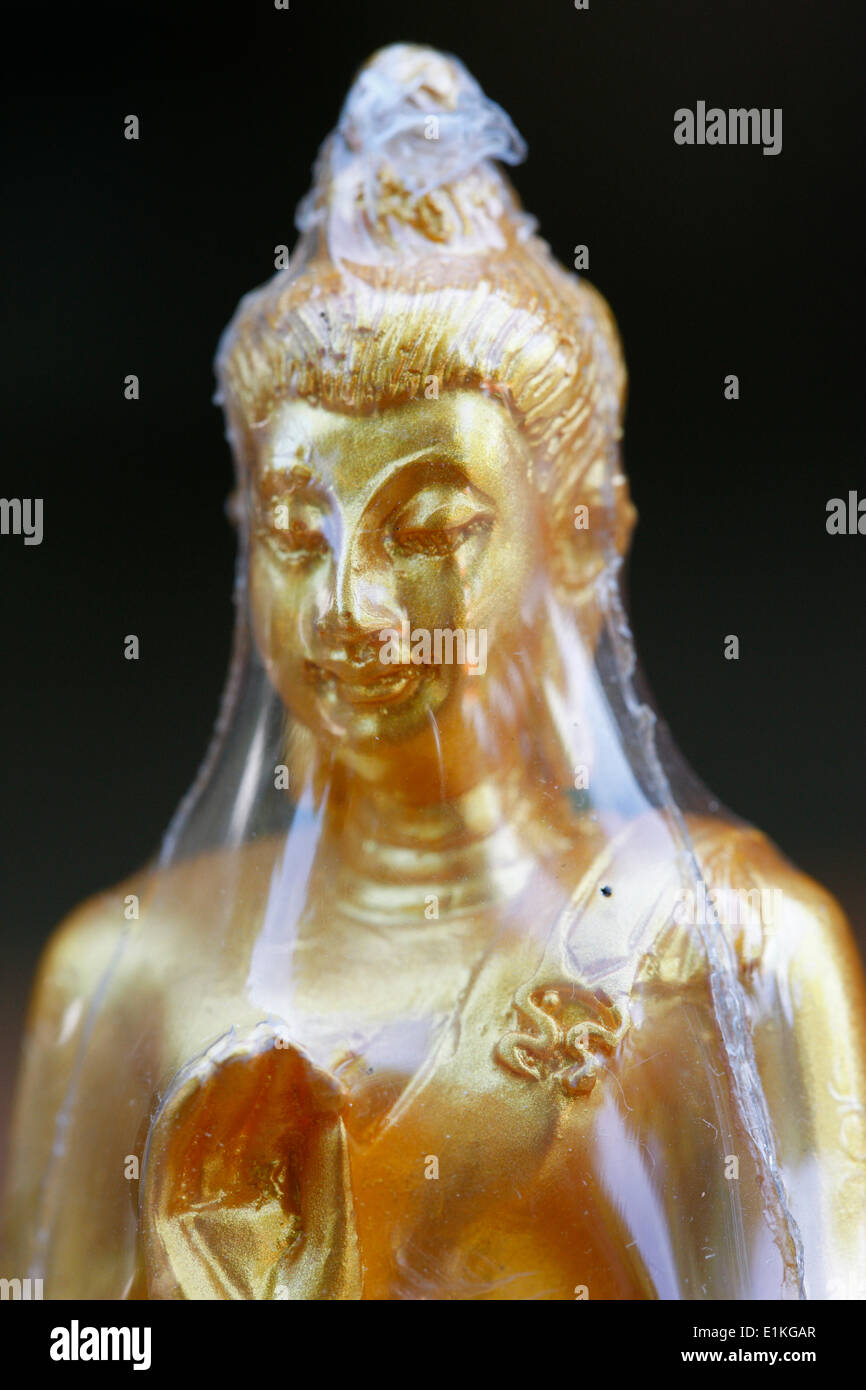 Wrapped Buddha statue Stock Photo - Alamy