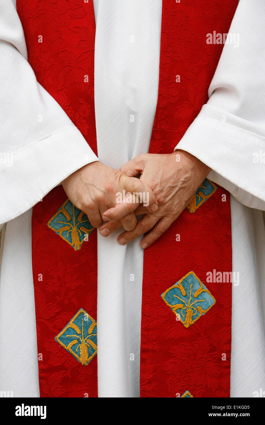 Catholic priest dressed for mass Stock Photo - Alamy