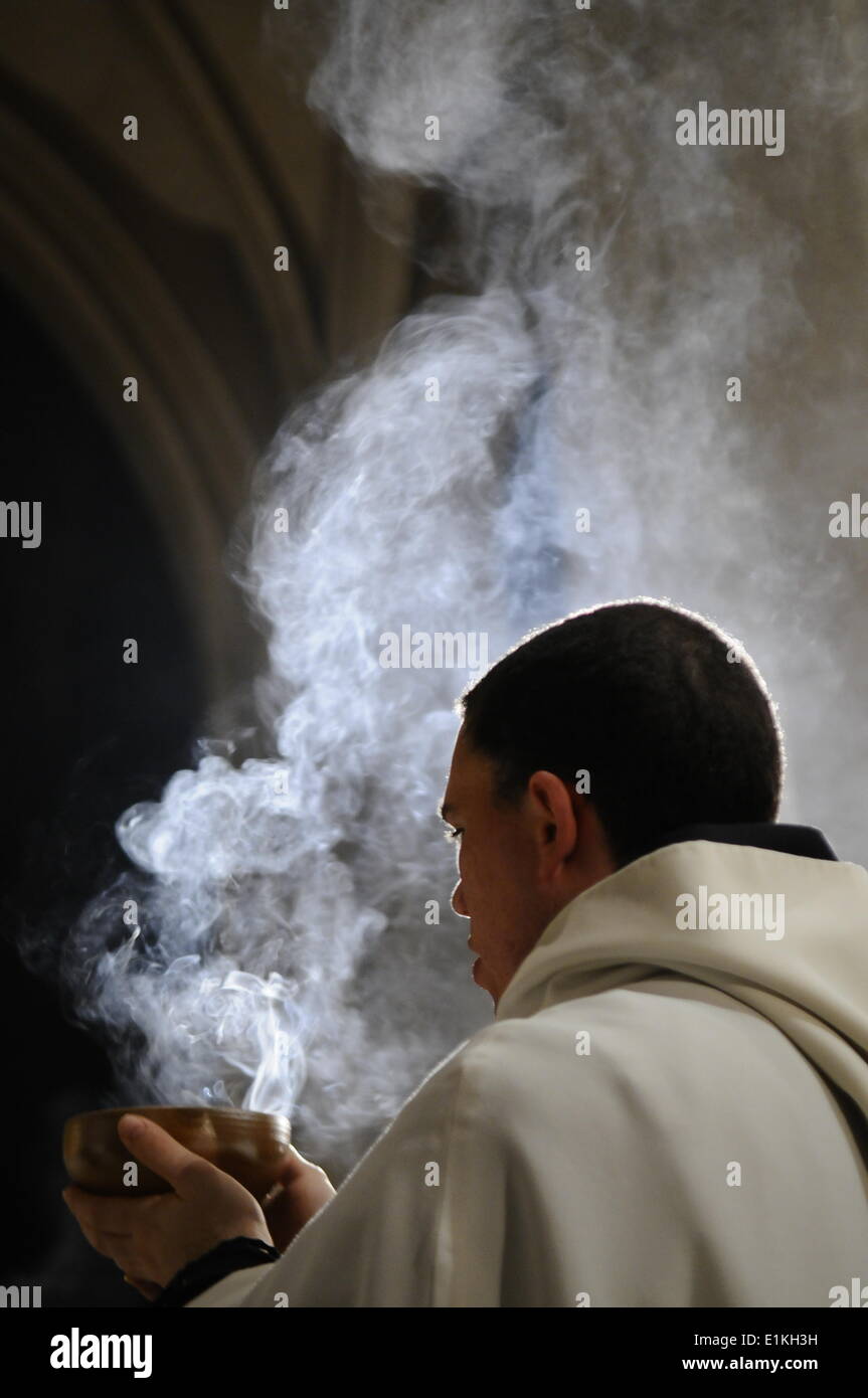 Monk holding an incense bowl during an oecumenical celebration Stock ...